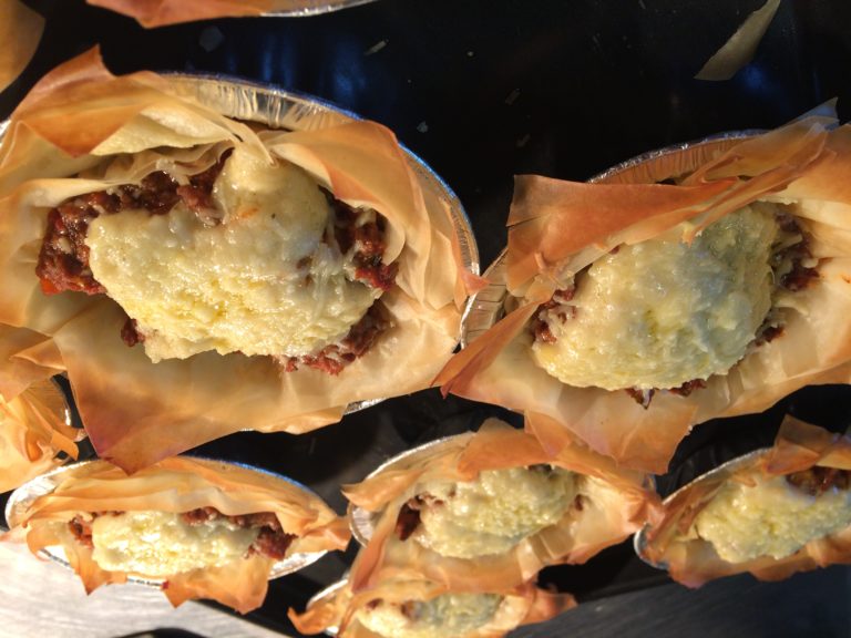 Greek minced beef filo tarts with a rich tomato sauce topped with a ...