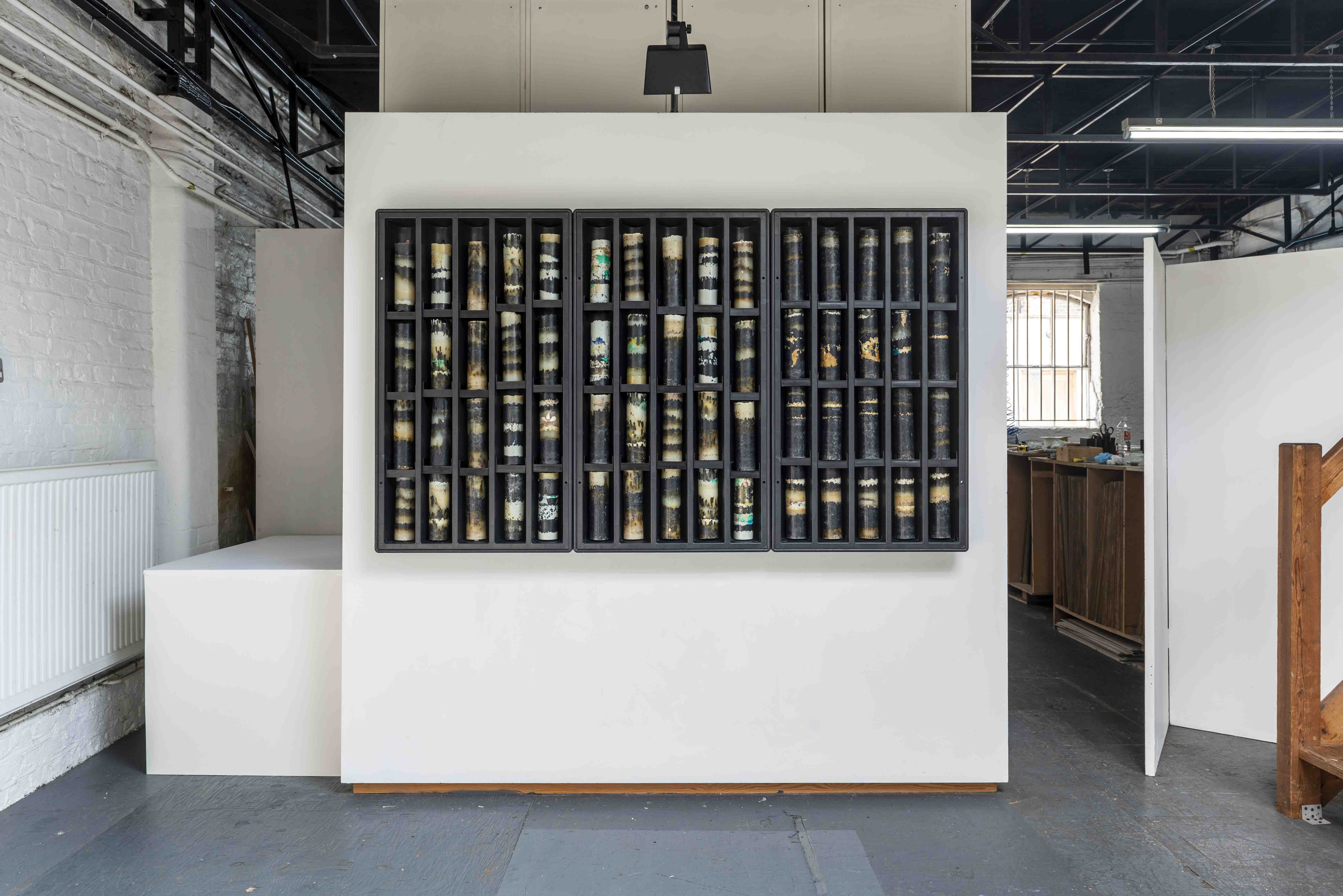 Core - installation with plastic casts in geological core sample boxes