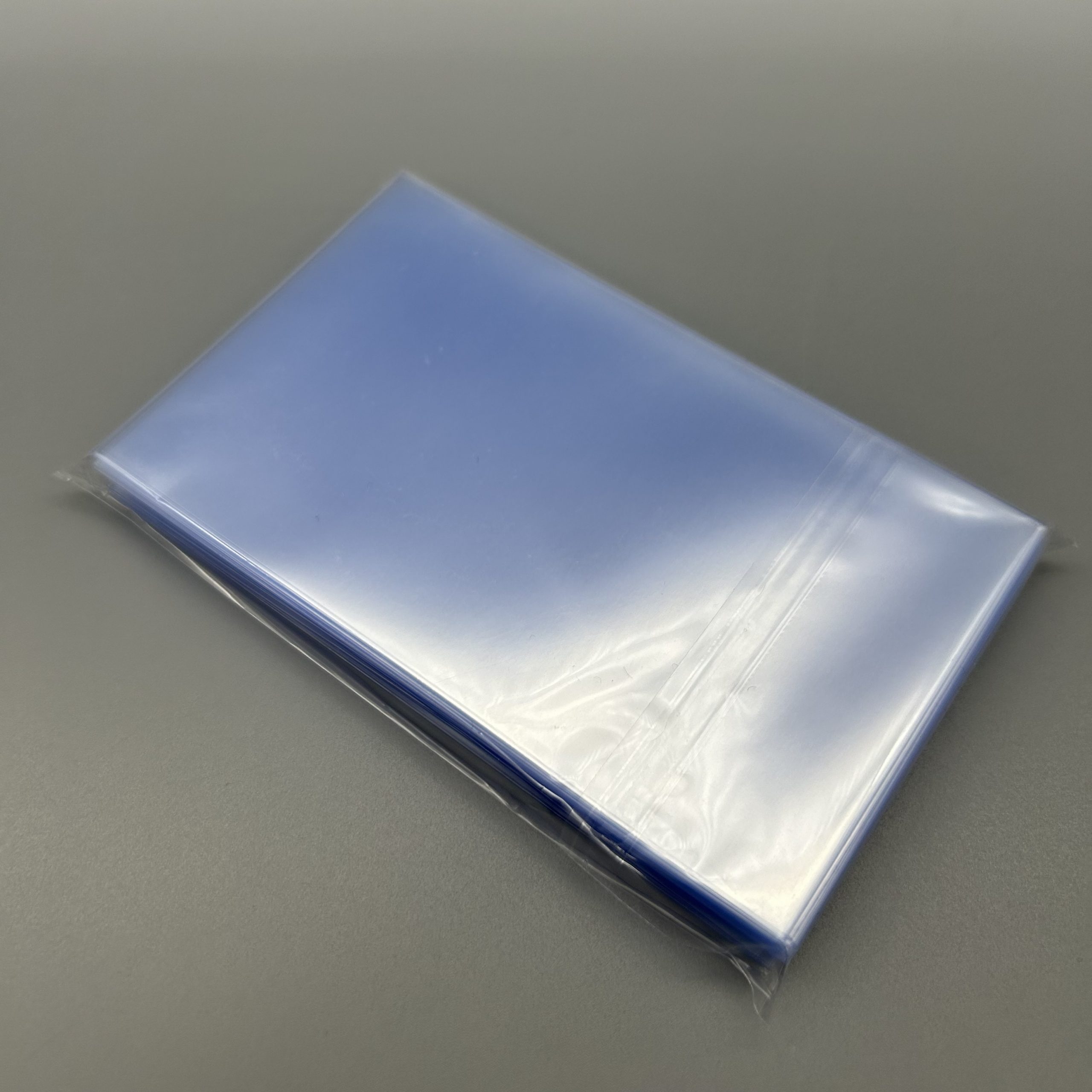 50-Pack Booster Pack Sleeves 73x122mm – RaukCard