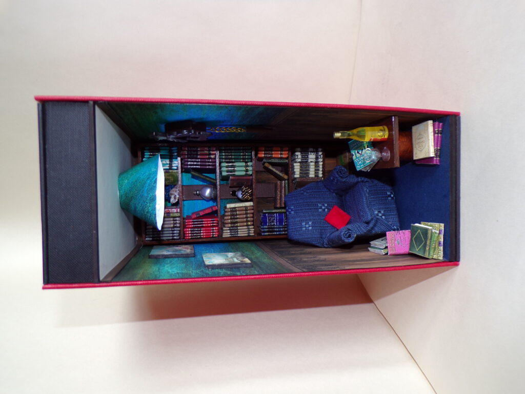 Booknook. Book Nook. Bookshelf insert. LED fairy lights. Cosy chair in ...