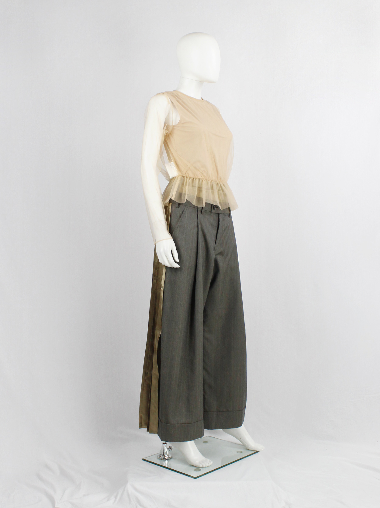 Noir Kei Ninomiya beige sheer jumper with gathered peplum Noir Kei Ninomiya beige sheer jumper with gathered peplum