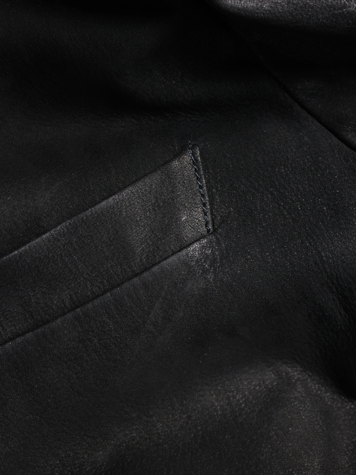Isaac Sellam black leather jacket with open back and belt Isaac Sellam black leather jacket with open back and belt