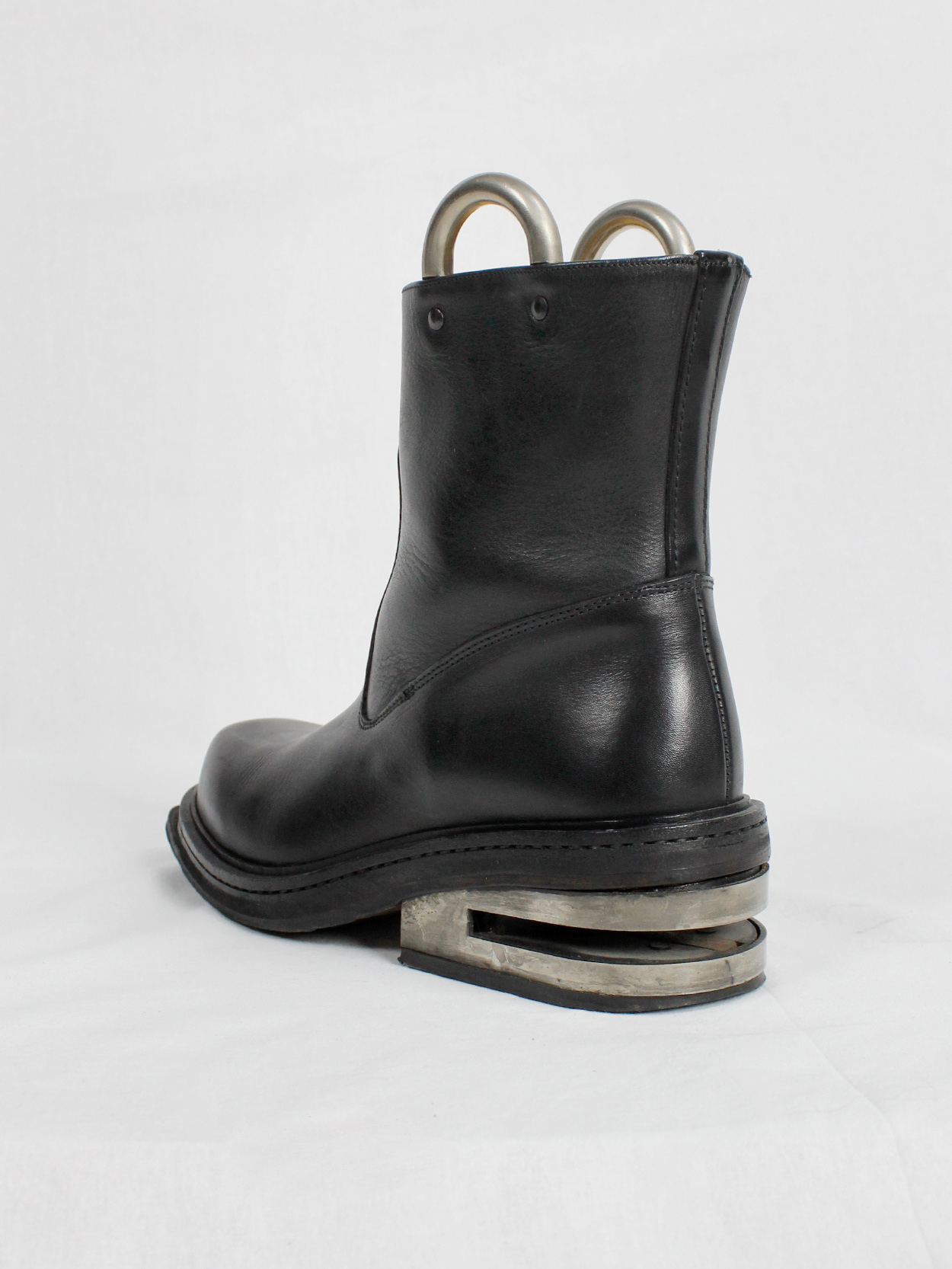 Dirk Bikkembergs black tall boots with metal slit heel and Dirk Bikkembergs black tall boots with metal slit heel and