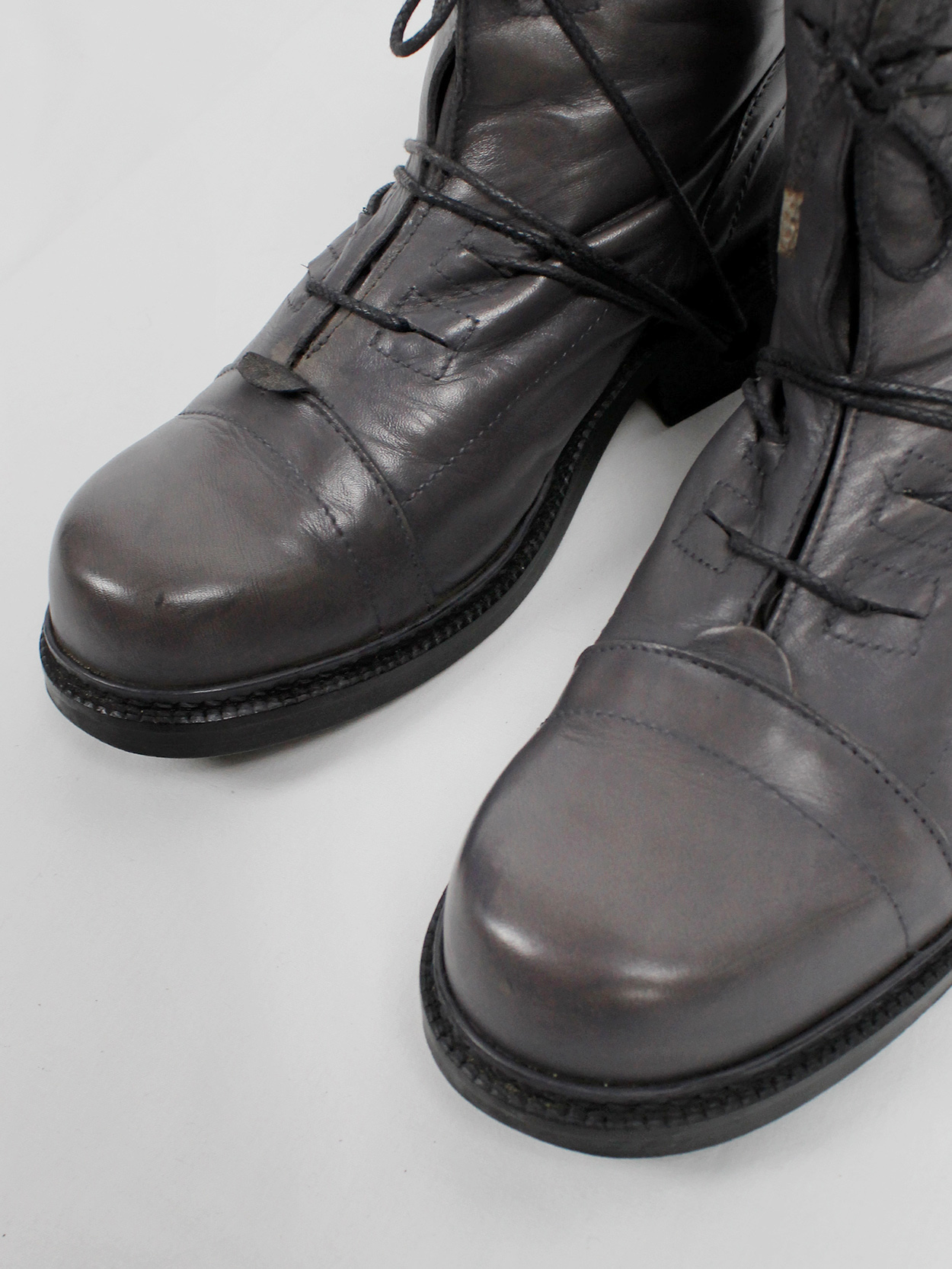 Dirk Bikkembergs grey tall boots with laces through the Dirk Bikkembergs grey tall boots with laces through the