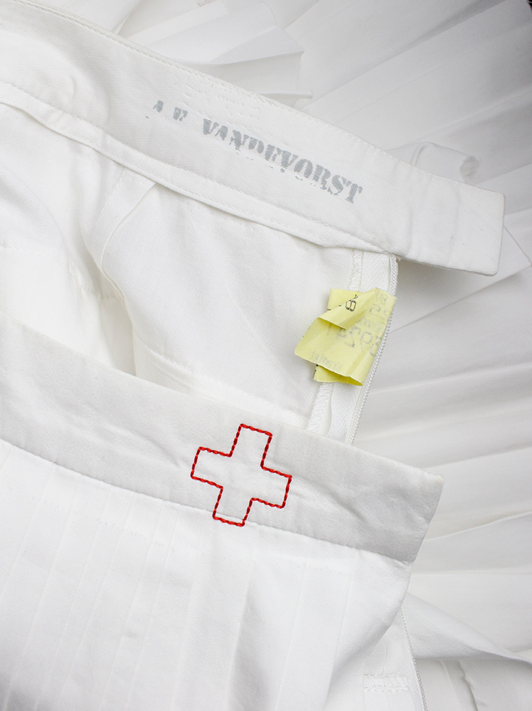A.F. Vandevorst white layered skirt with multiple pleated panels ...