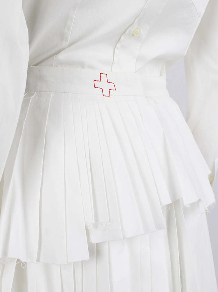 A.F. Vandevorst white layered skirt with multiple pleated panels ...