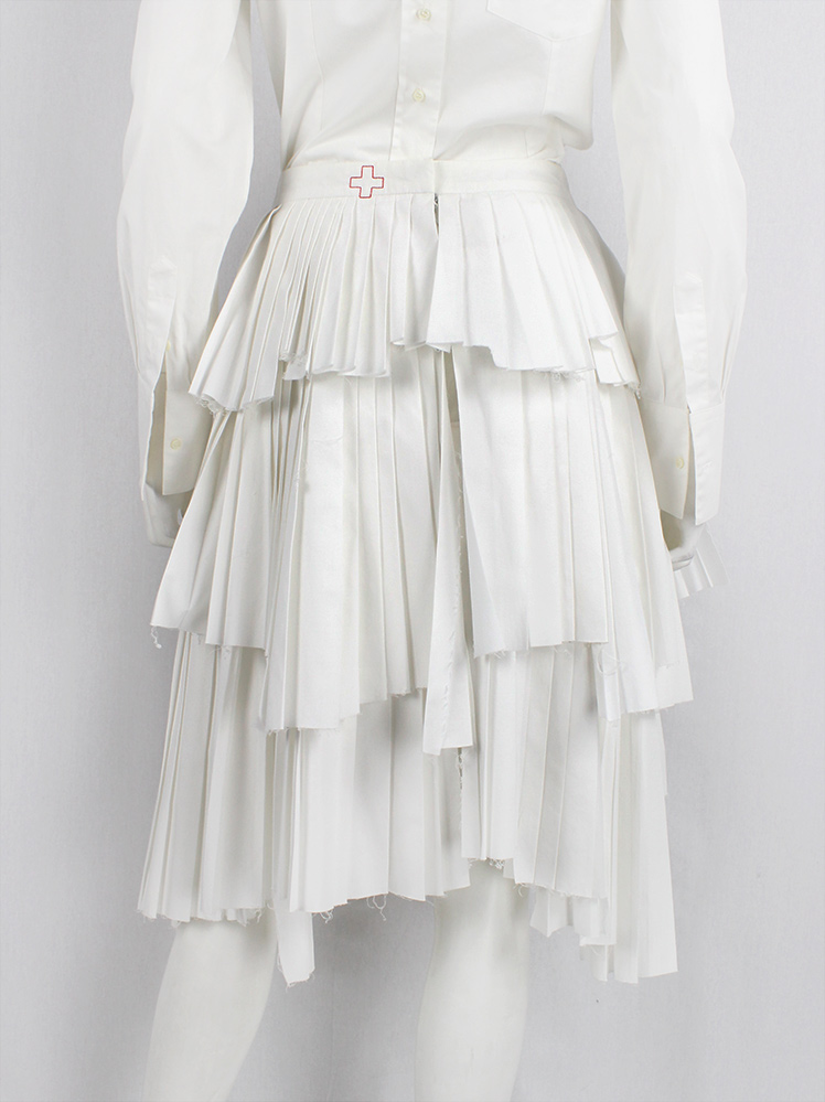 A.F. Vandevorst white layered skirt with multiple pleated panels ...