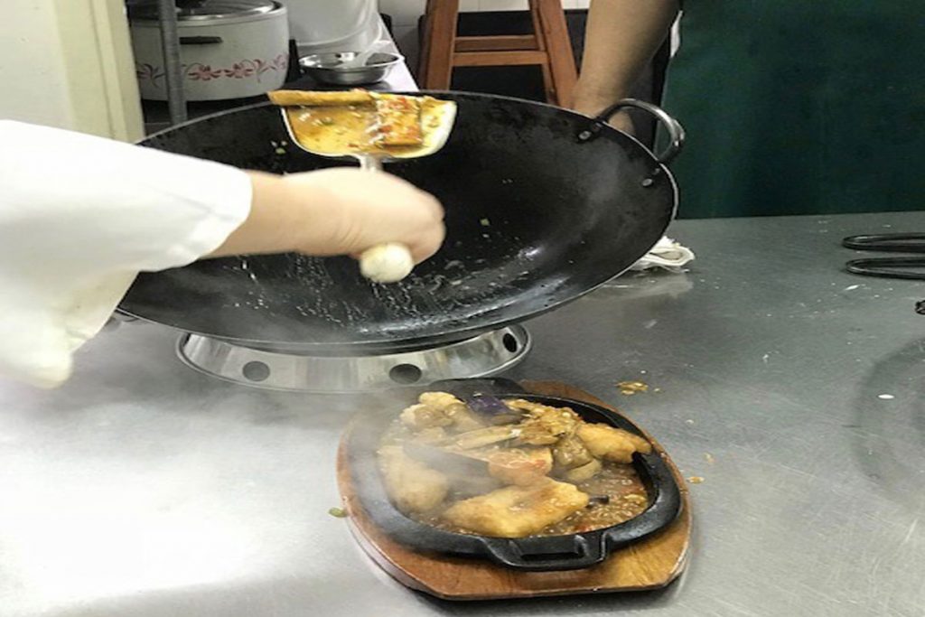 Stir-frying in a wok on high fire the Asian way - wilfriedscooking