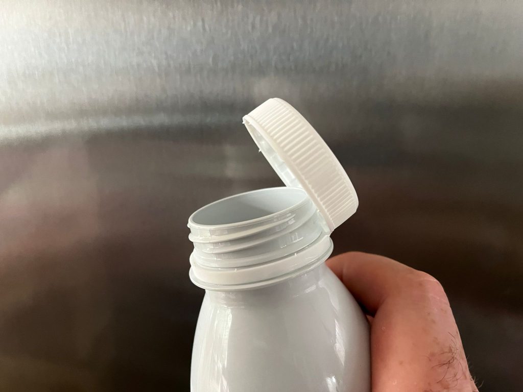 Why are Plastic Bottle Tops Connected to Bottles Now?